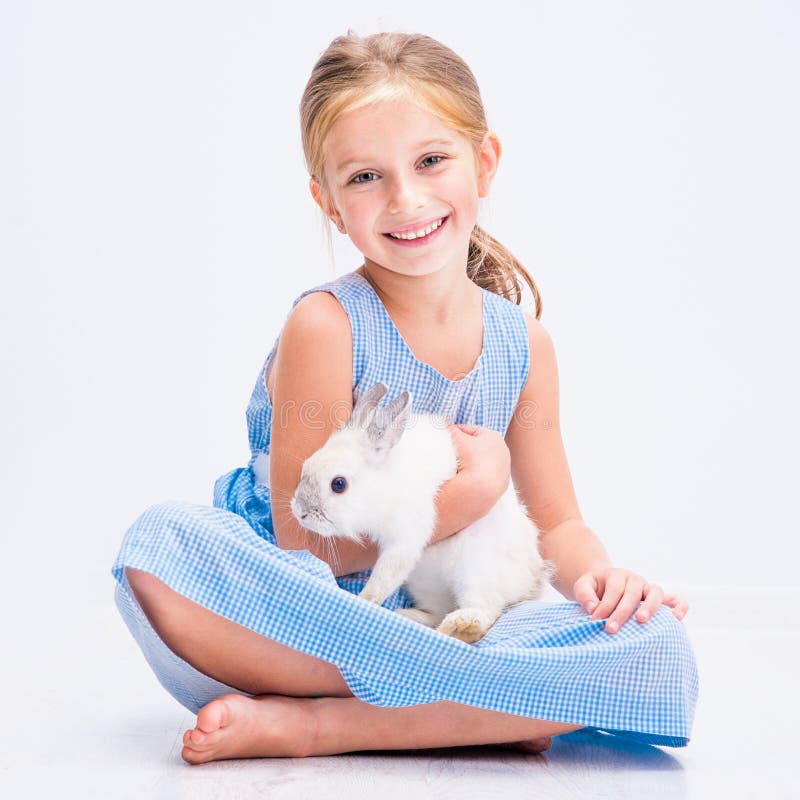 Cute Little Girl a White Rabbit Stock Photo - Image of cheerful, face ...