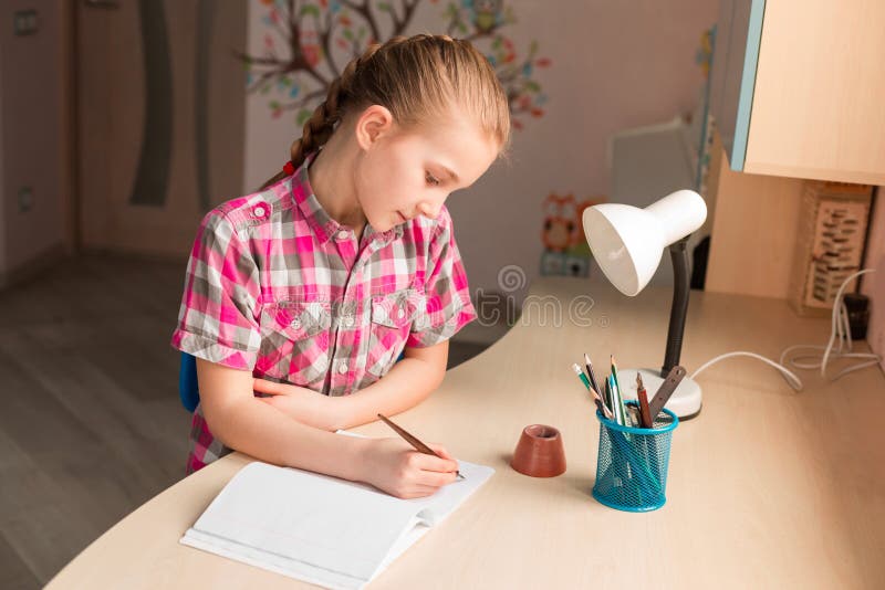 Cute Little Girl Writing Her Homework Stock Image - Image of girl ...