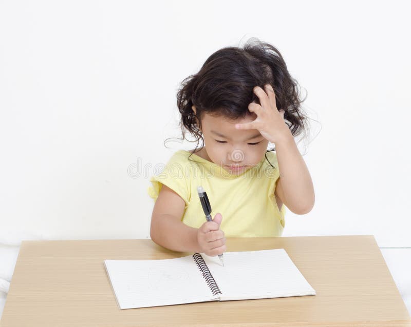 Cute Little Girl Writing Something Stock Image - Image of beautiful ...