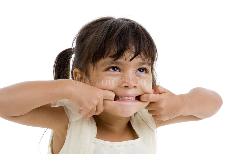 Cute Little Kid Making A Grimace - Free Photo from StockFreeImages