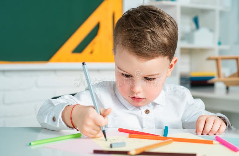 Cute Little Preschool Kid Boy in a Classroom. Elementary School and ...