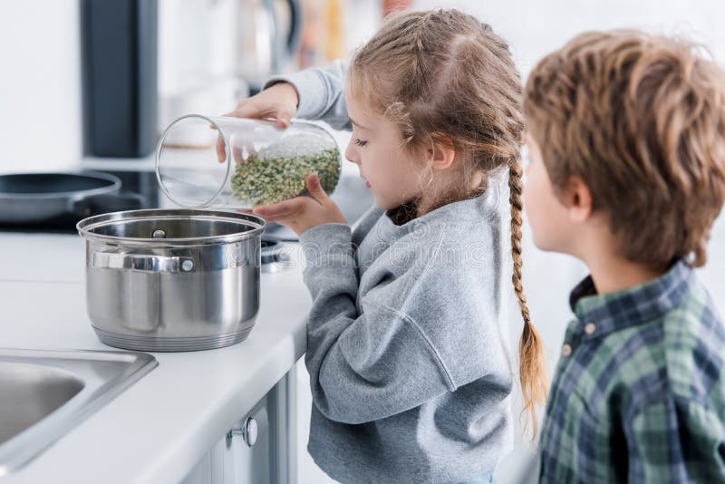 Siblings Cooking in Chef S Hats Stock Image - Image of people, little ...
