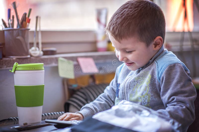 Cute Little Baby Boy Using a Calculator Stock Photo - Image of ...