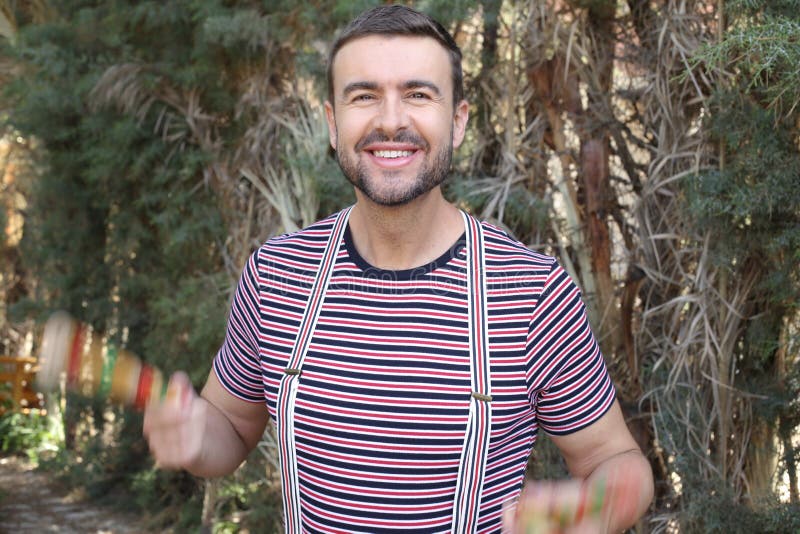 Cute Male Juggler Practicing Outdoors Stock Photo - Image of balance ...
