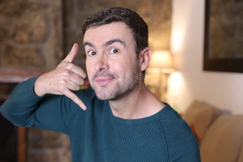 Cute Man Doing the `call Me` Gesture Stock Image - Image of ...