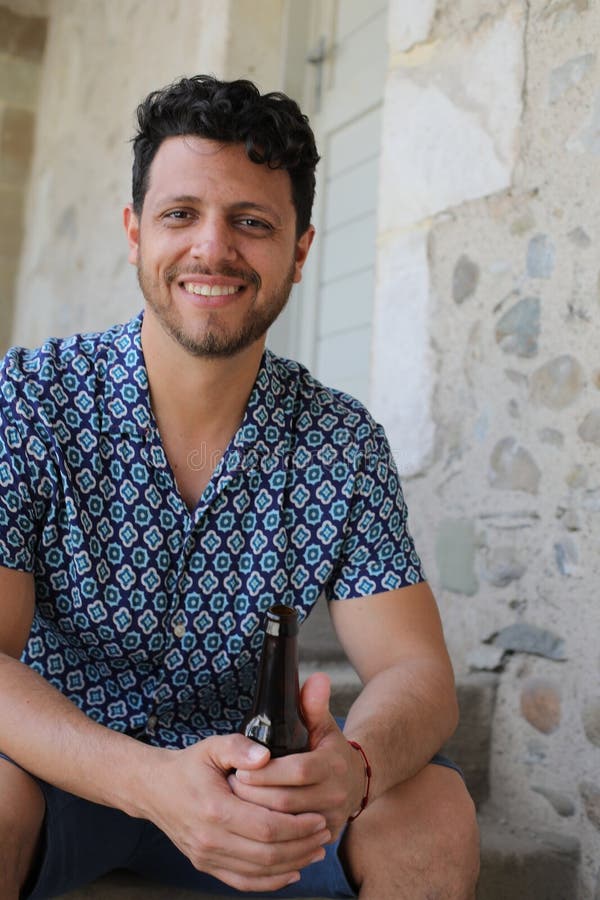 Cute man drinking a beer stock photo. Image of alcohol - 338481290