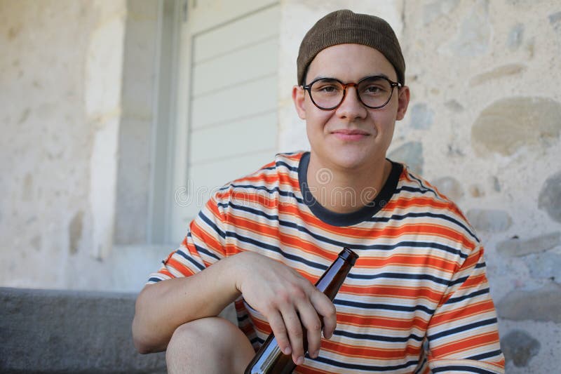 Cute man drinking a beer stock photo. Image of freshness - 330980924