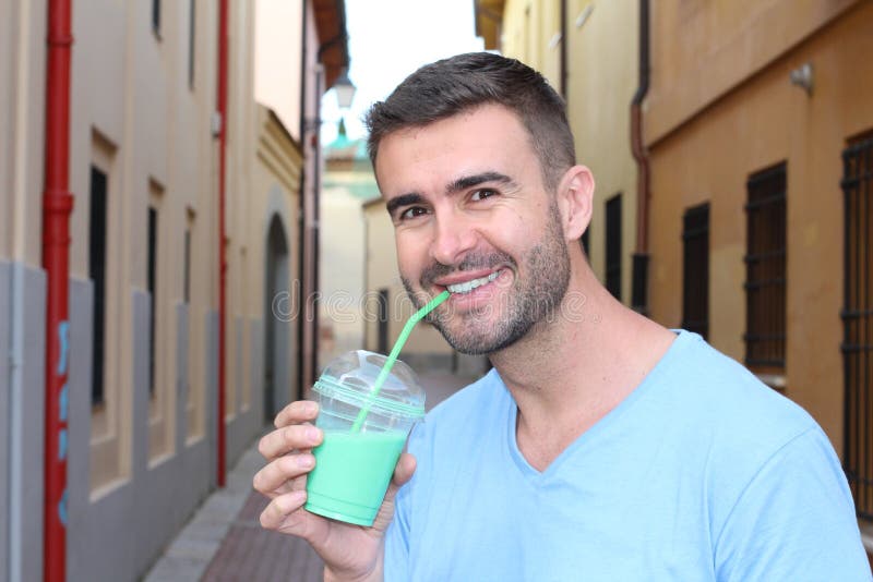 Cute Man Drinking a Shake Outdoors Stock Image - Image of beverage ...