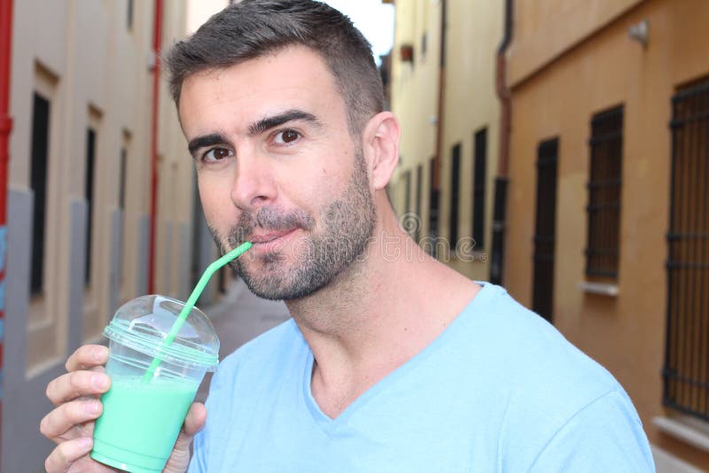 Cute Man Drinking a Shake Outdoors Stock Image - Image of beverage ...
