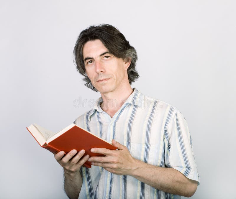 Cute man reading a book stock image. Image of lifestyle - 20521685
