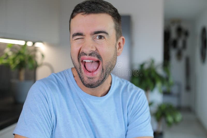 Cute man winking an eye stock image. Image of enjoy - 345951591