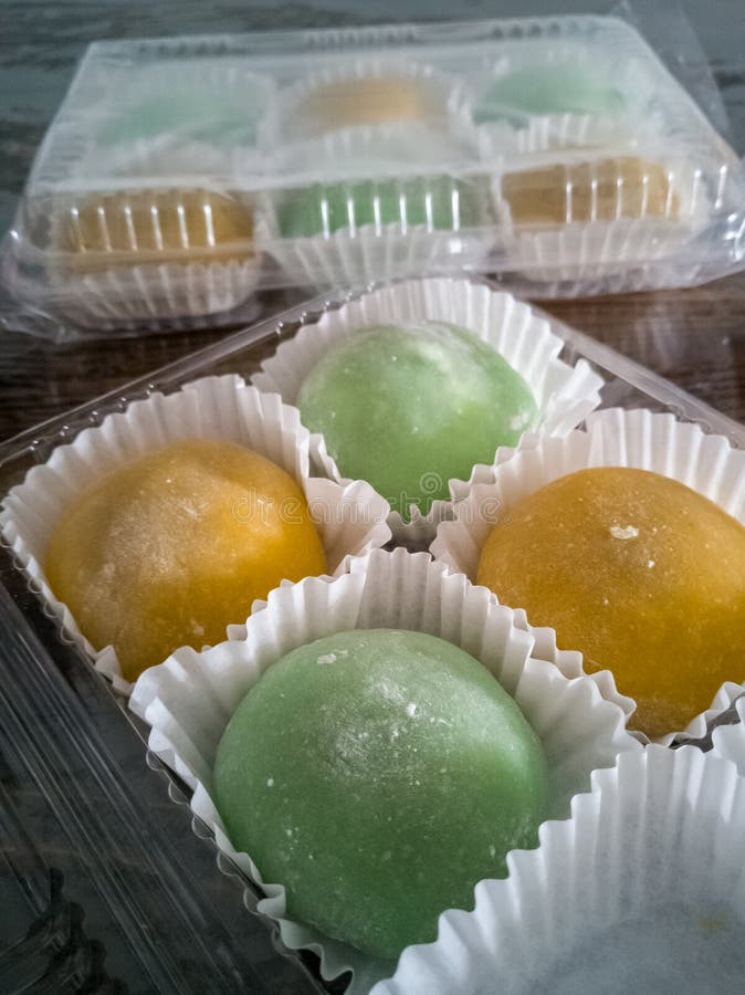 Cute Mochi in Green and Yellow Colour in a Takeaway Container Box Stock ...