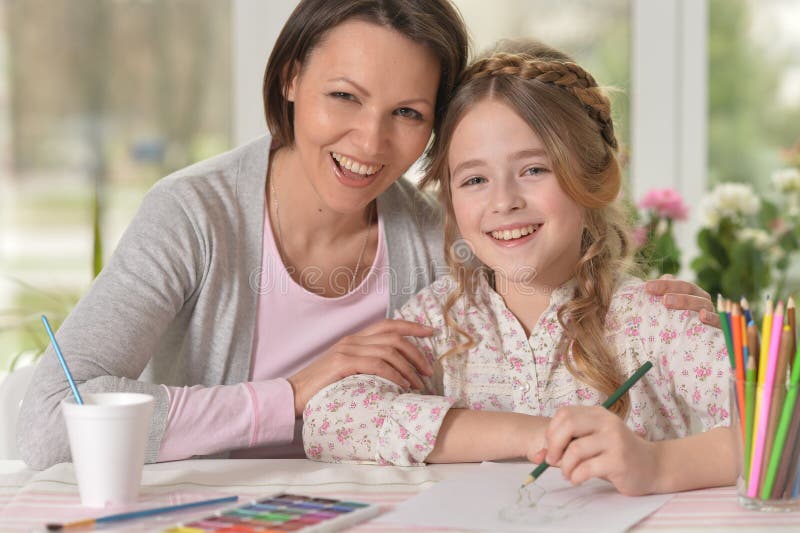 Cute Mother and Daughter Drawing with Pencils Stock Image - Image of ...