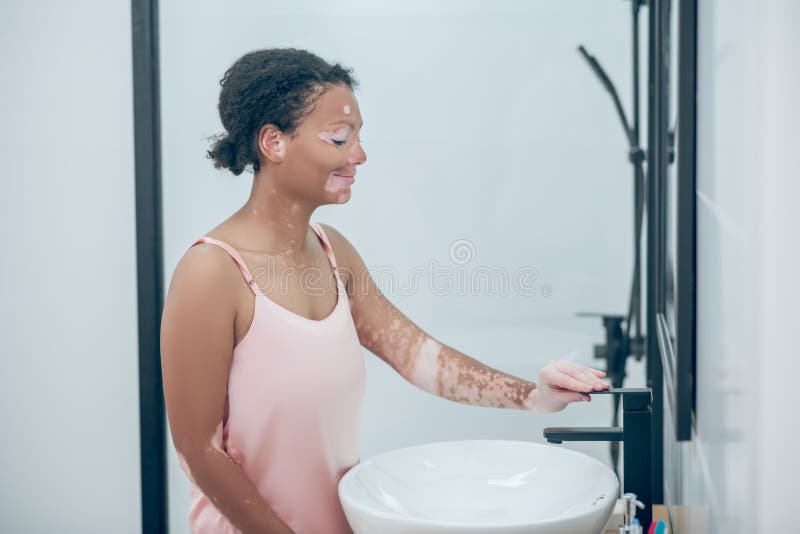 A Cute Mulatta in Bathroom in the Morning Stock Photo - Image of ...