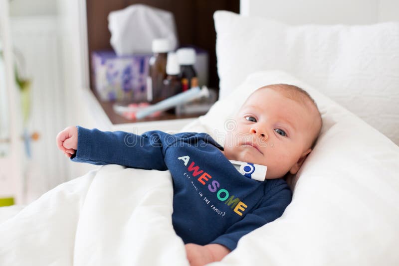 Cute Newborn Baby Boy, Lying in Bed with Cold Stock Image - Image of ...