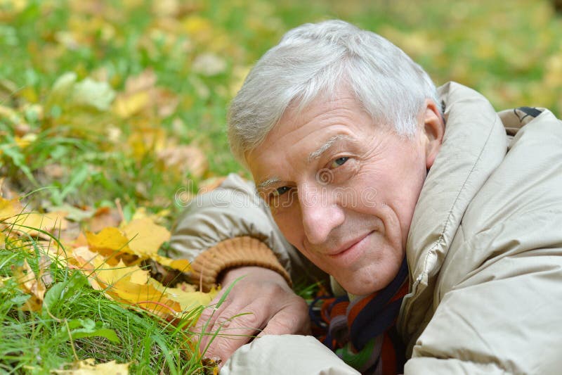 Cute old man lying stock image. Image of fashionable - 59248869