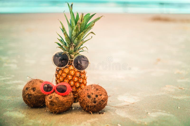 Cute Pineapple and Coconuts Wearing Sunglasses Relaxing by the O Stock ...
