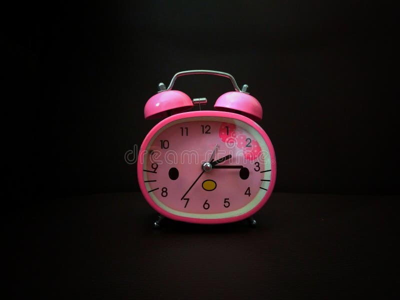 Cute pink alarm clock. stock photo. Image of cute, watch - 232657440