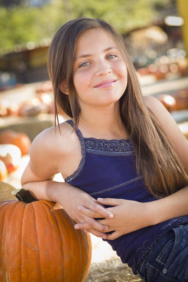 Cute Preteen Girl Portrait at the Pumpkin Patch Stock Photo - Image of ...