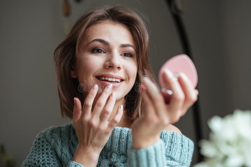 Cute Pretty Lady Sitting in Cafe and Looking at Mirror. Stock Photo ...