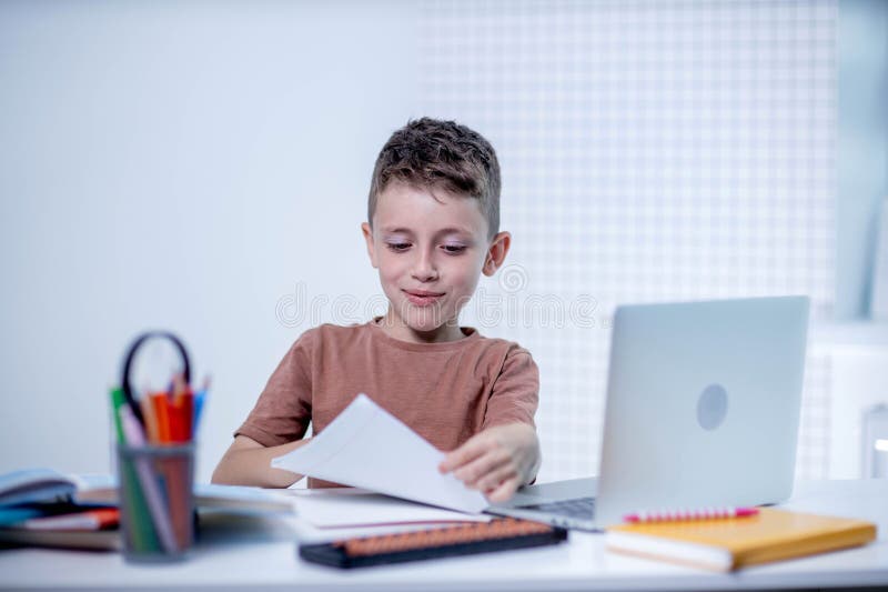 Boy is Doing His Homework in the Kitchen Stock Image - Image of ...