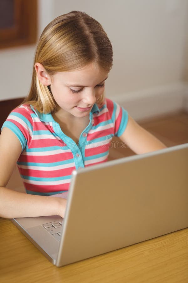 Cute Pupil in Class Using Laptop Stock Image - Image of childhood ...