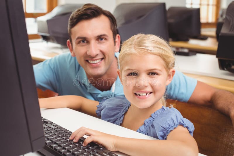 Cute Pupil in Computer Class with Teacher Stock Image - Image of ...