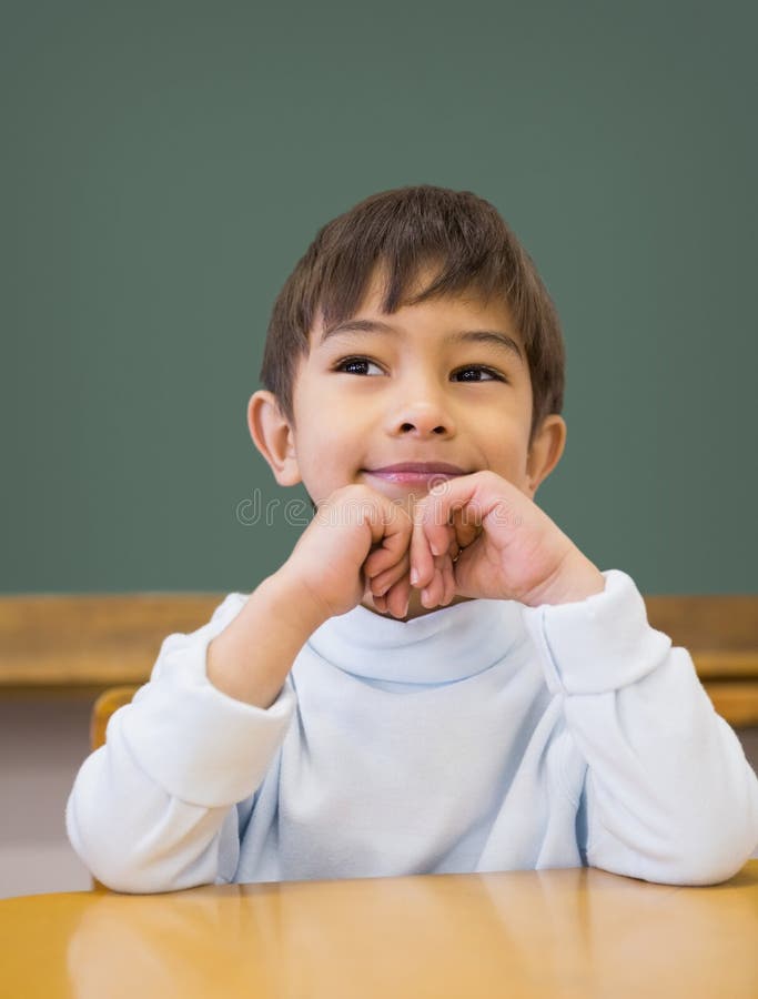 Cute Pupil Thinking at Desk in Classroom Stock Photo - Image of away ...
