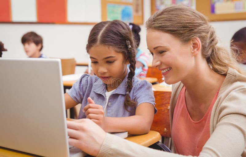 Cute Pupil Using Computer with Teacher Stock Image - Image of elementary, knowledge: 49207487
