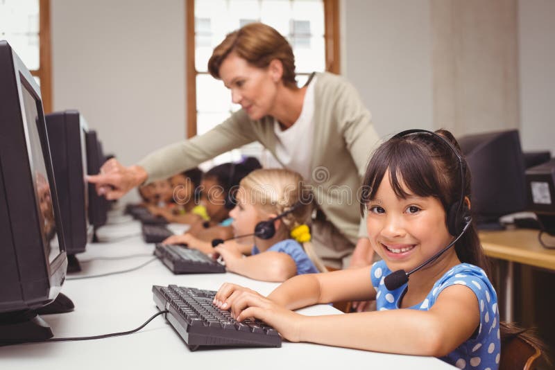 Cute Pupils in Computer Class with Teacher Stock Image - Image of ...