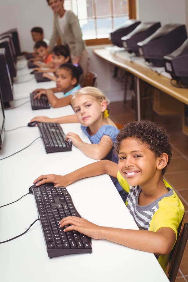 Cute Pupils in Computer Class with Teacher Stock Image - Image of ...
