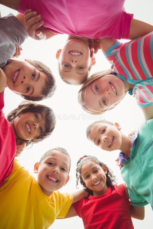 Cute pupils in a huddle stock image. Image of cute, girl - 58139063