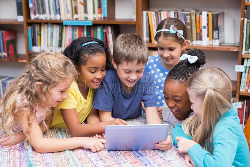 Diverse Group of Kids Looking at Tablet. Stock Image - Image of girls ...