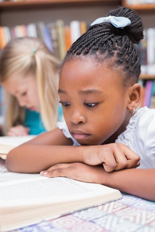 Cute Pupils Reading Books in Library Stock Image - Image of view ...