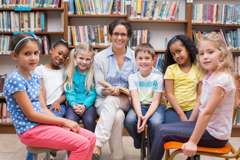 Cute Pupils and Teacher Reading in Library Stock Image - Image of ...
