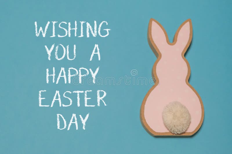 Cute Rabbit with a Fluffy Tail is on a Blue Background Stock Image ...