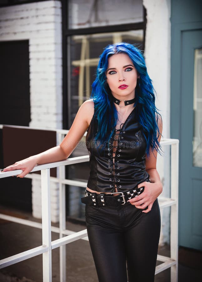 Cute Rock Girl Informal Model With Blue Hair Dressed In Black Leather