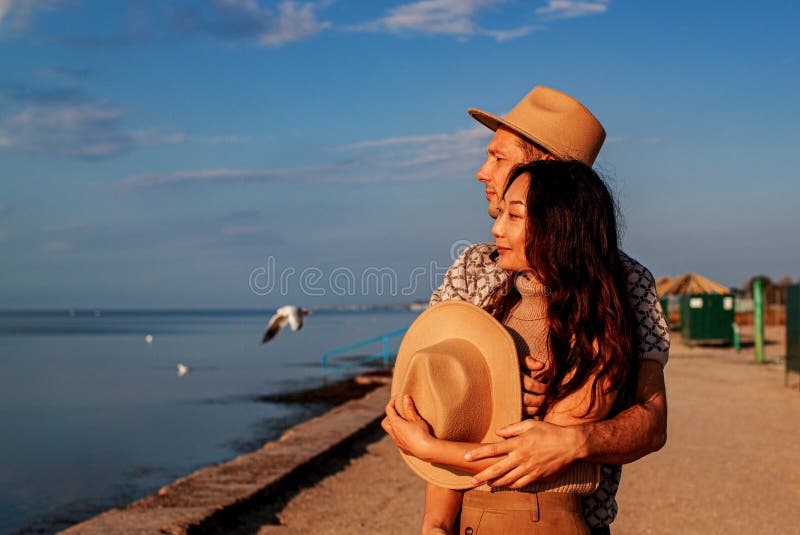 Romantic Happy Multi-Ethnic Couple on Beach in Love at Sunset Stock ...