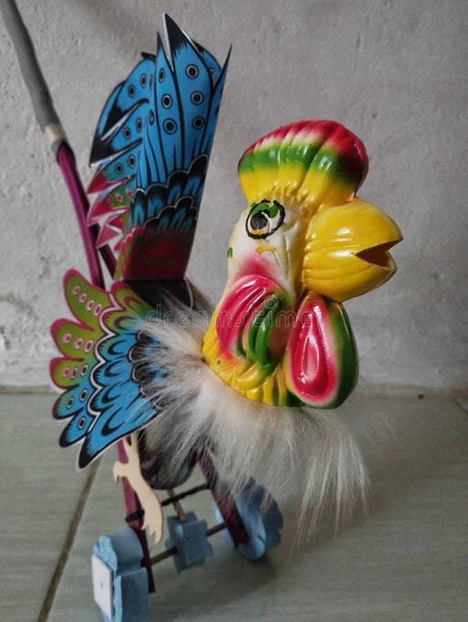 A cute rooster toy for kid stock image. Image of toys - 265725507