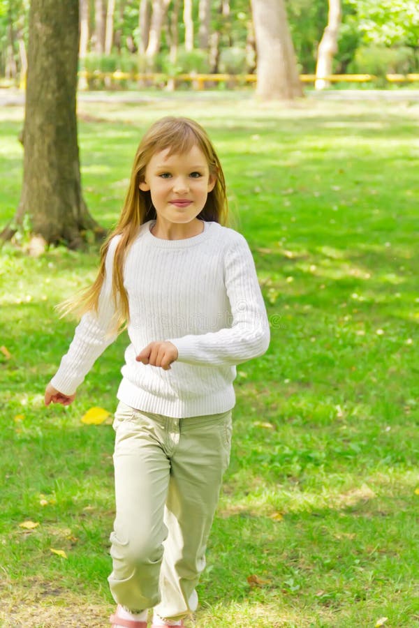 Cute running girl stock photo. Image of action, caucasian - 74107570