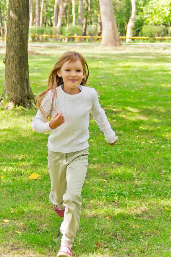 Cute running girl stock image. Image of schoolgirl, smiling - 54640009
