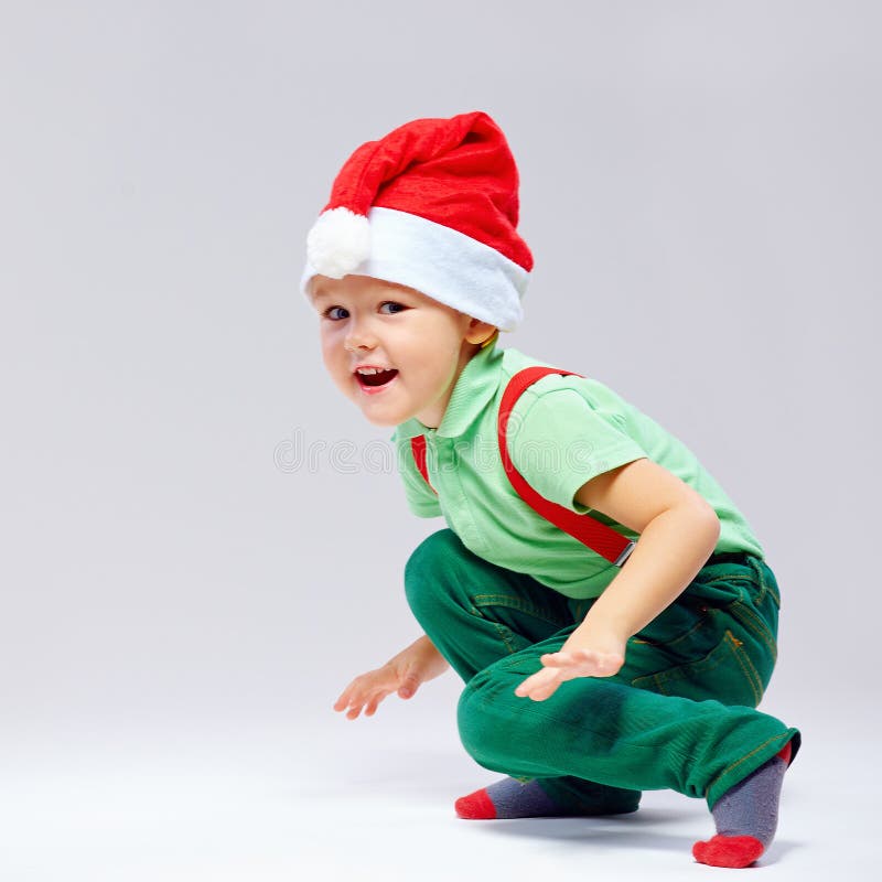 Cute Santa S Helper Squats on White Stock Photo - Image of dance ...