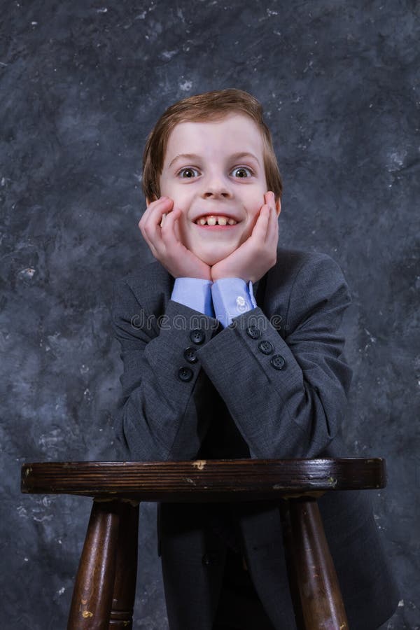 Cute Schoolboy Dressed in Suit Studio Portrait. Stock Photo - Image of ...