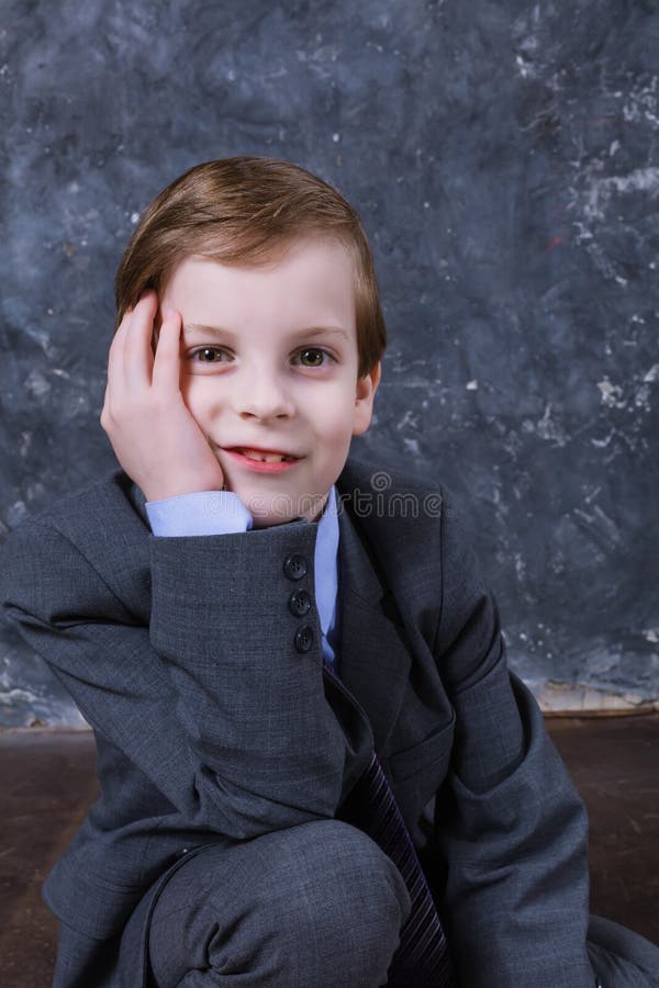 Cute Schoolboy Dressed in Suit Studio Portrait. Stock Photo - Image of ...