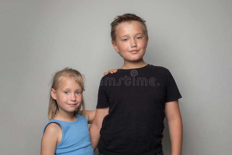 Cute Siblings Brother Sister Hugging Posing Over White Background Stock ...