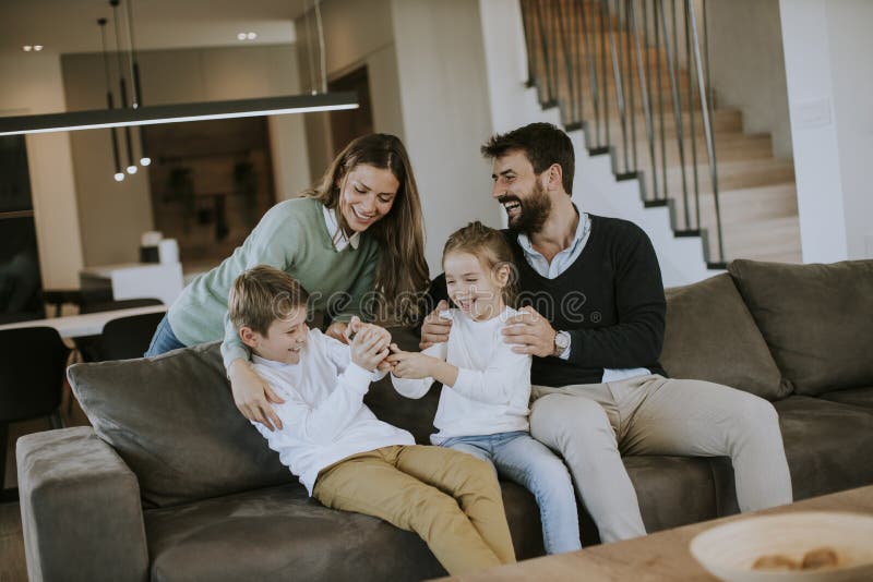 Siblings Fighting Over TV Remote Control at Home Stock Image - Image of ...