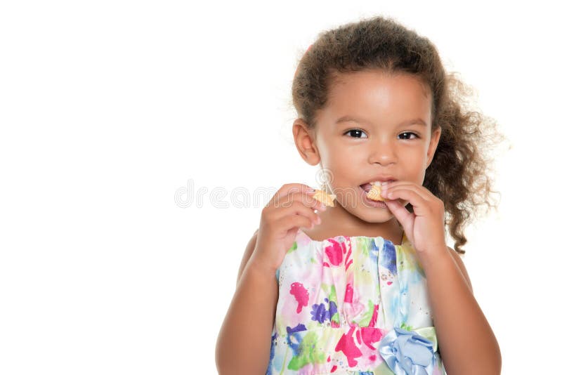 Cute Small Girl Eating a Cookie Stock Image - Image of eating, face ...