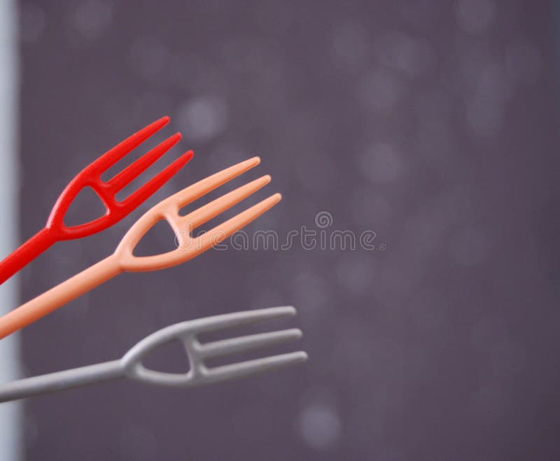 Cute small plastic forks stock photo. Image of people - 45387040