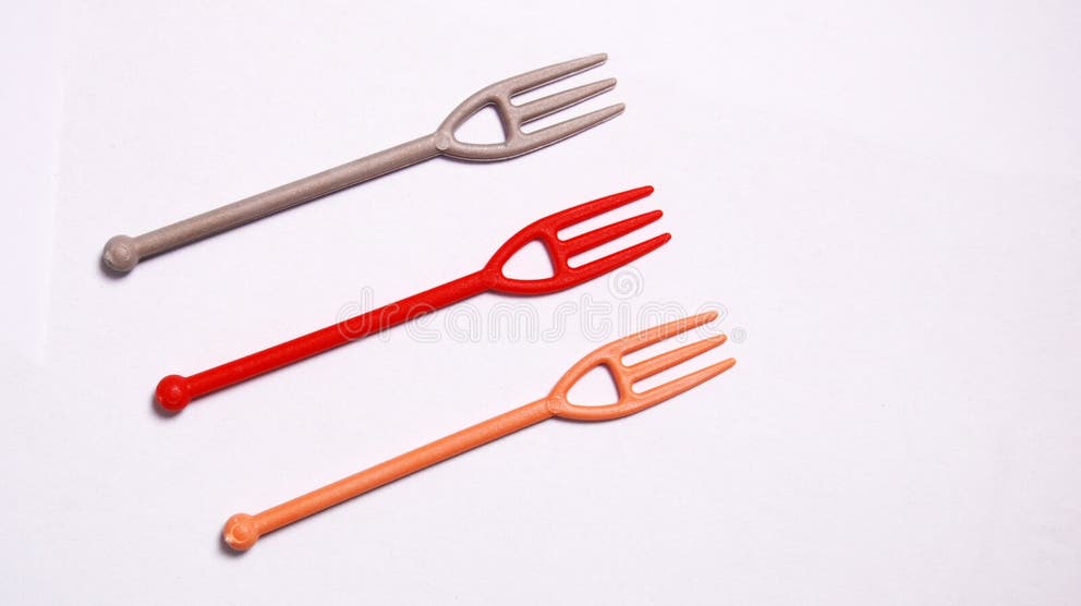 Cute small plastic forks stock photo. Image of forks - 45387122