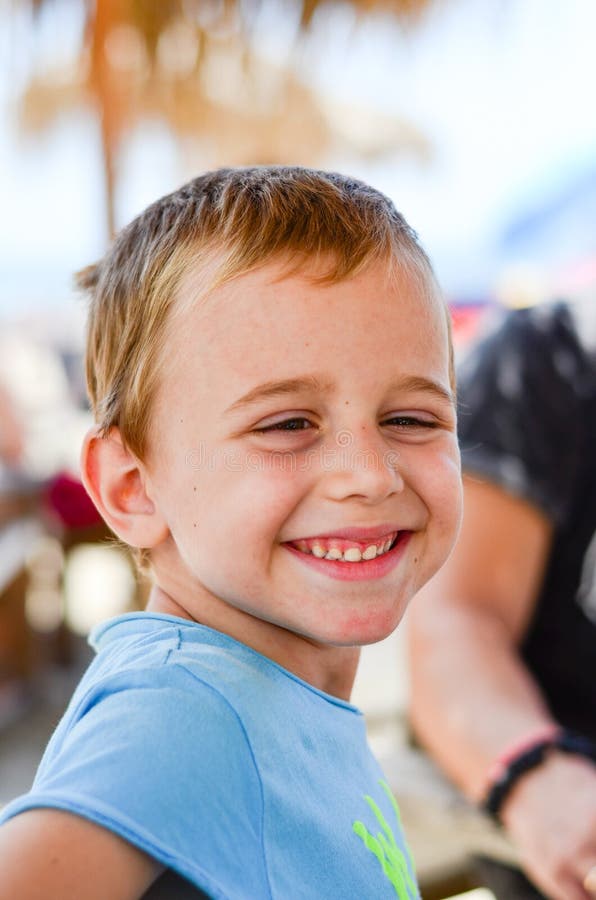 Cute smiling boy stock photo. Image of cheerful, grey - 78145862